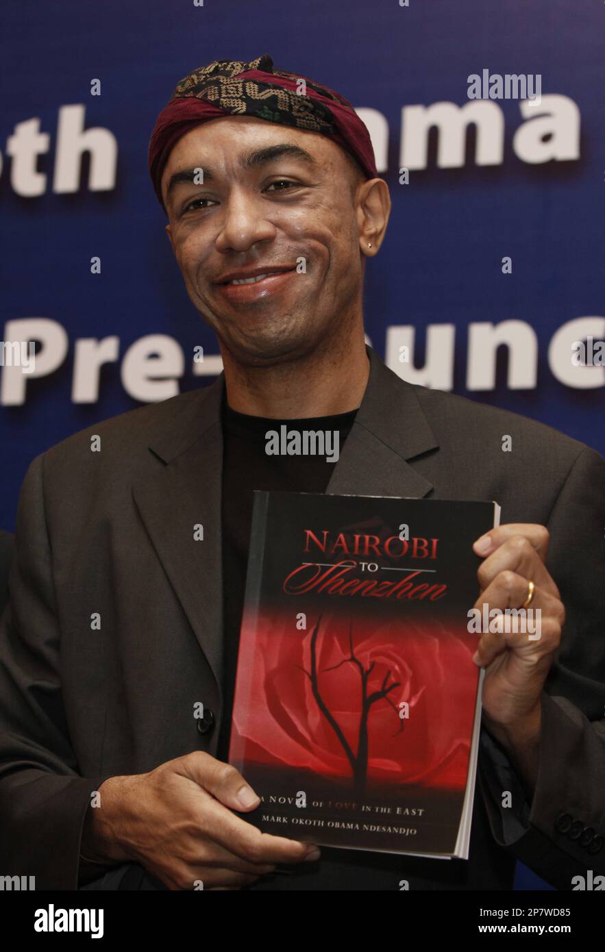 Mark Ndesandjo, one of President Barack Obama's half-siblings, holds ...