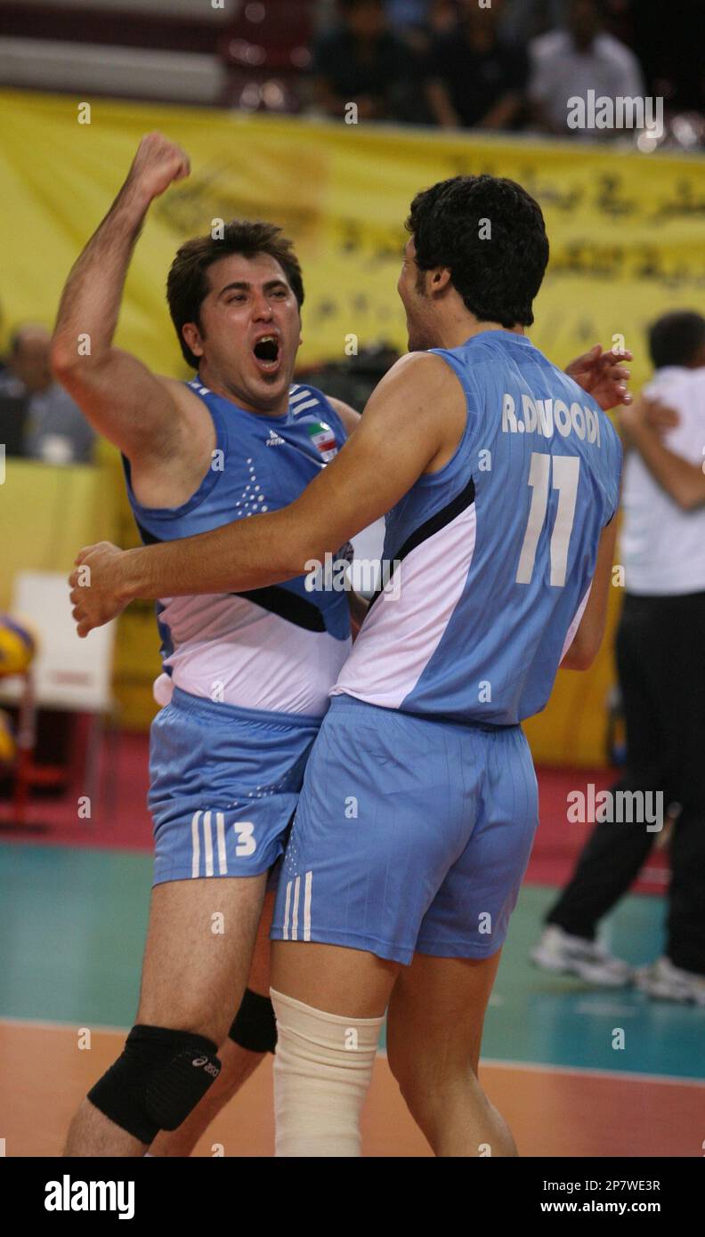 Paykan Tehran's Captian Amir Hosseini, left, reacts with Rehman Davoodi ...
