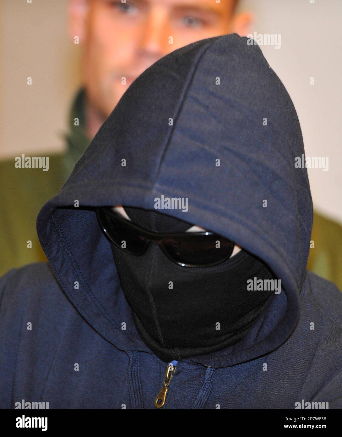 The suspected murderer, 28-year-old Alex Wiens, is brought into the ...