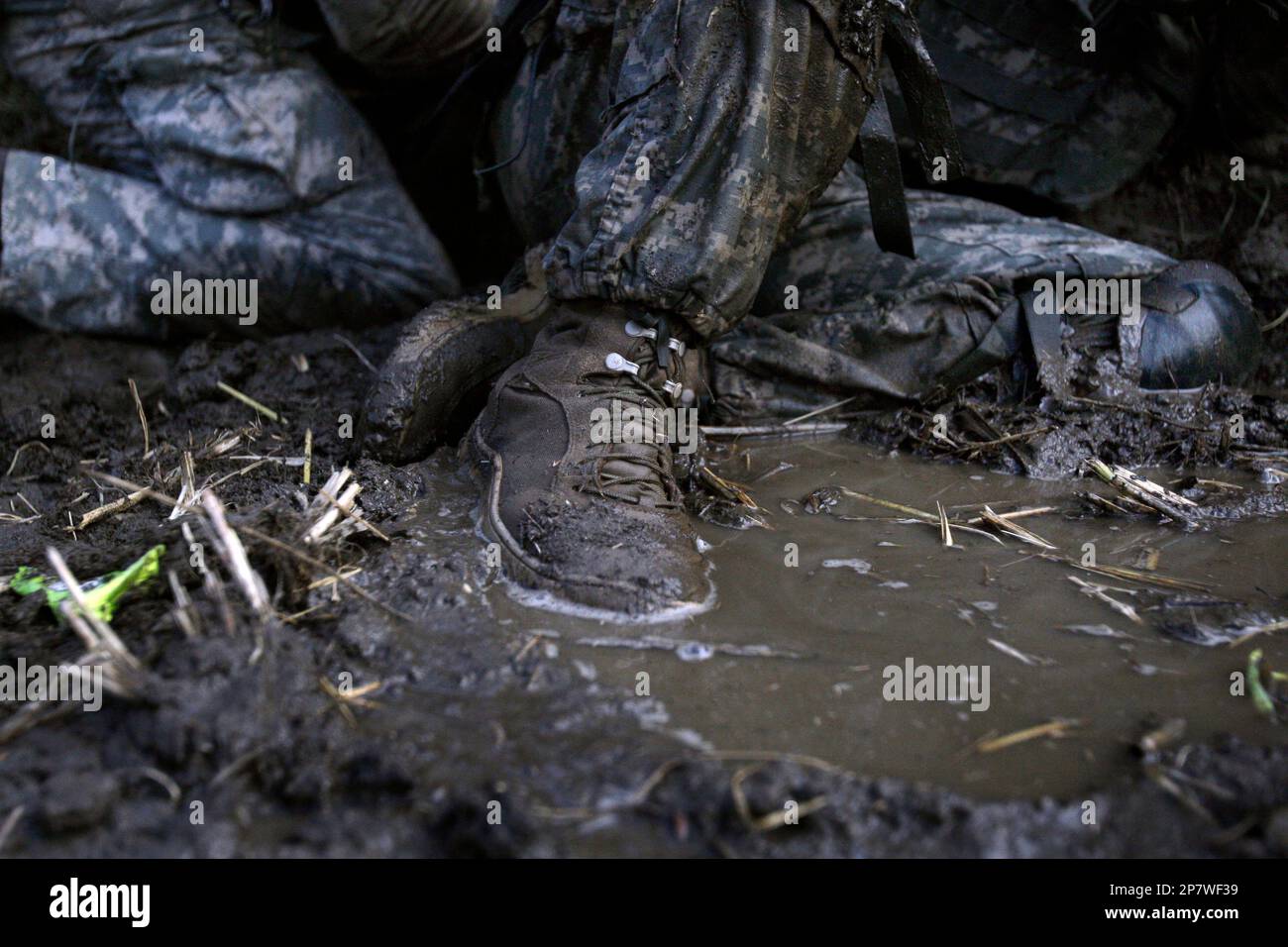 The boots of a U.S. soldier from the 2nd Battalion, 12th Infantry Regiment, 4th Brigade Combat ...