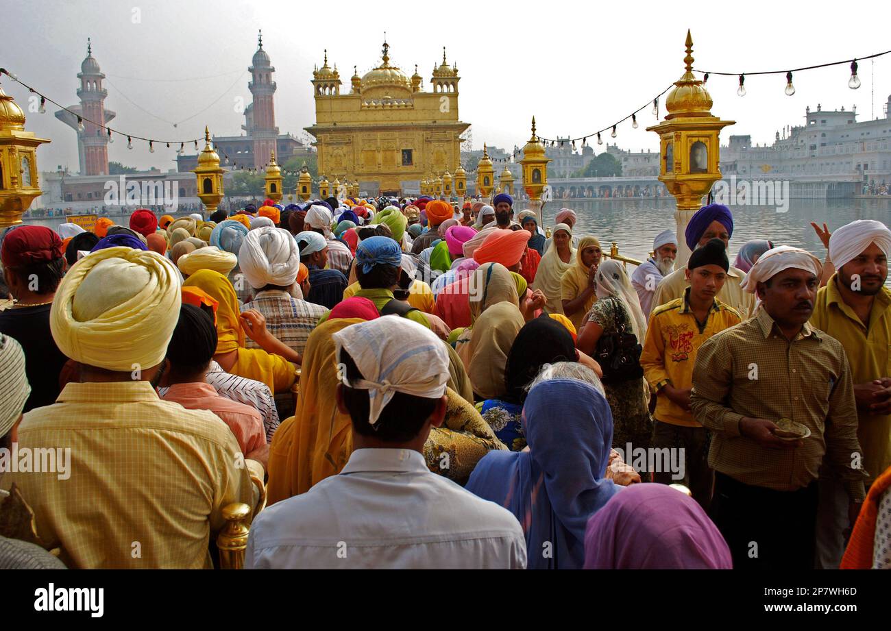Sikh devotees throng Golden Temple to pay obeisance on the occasion of ...