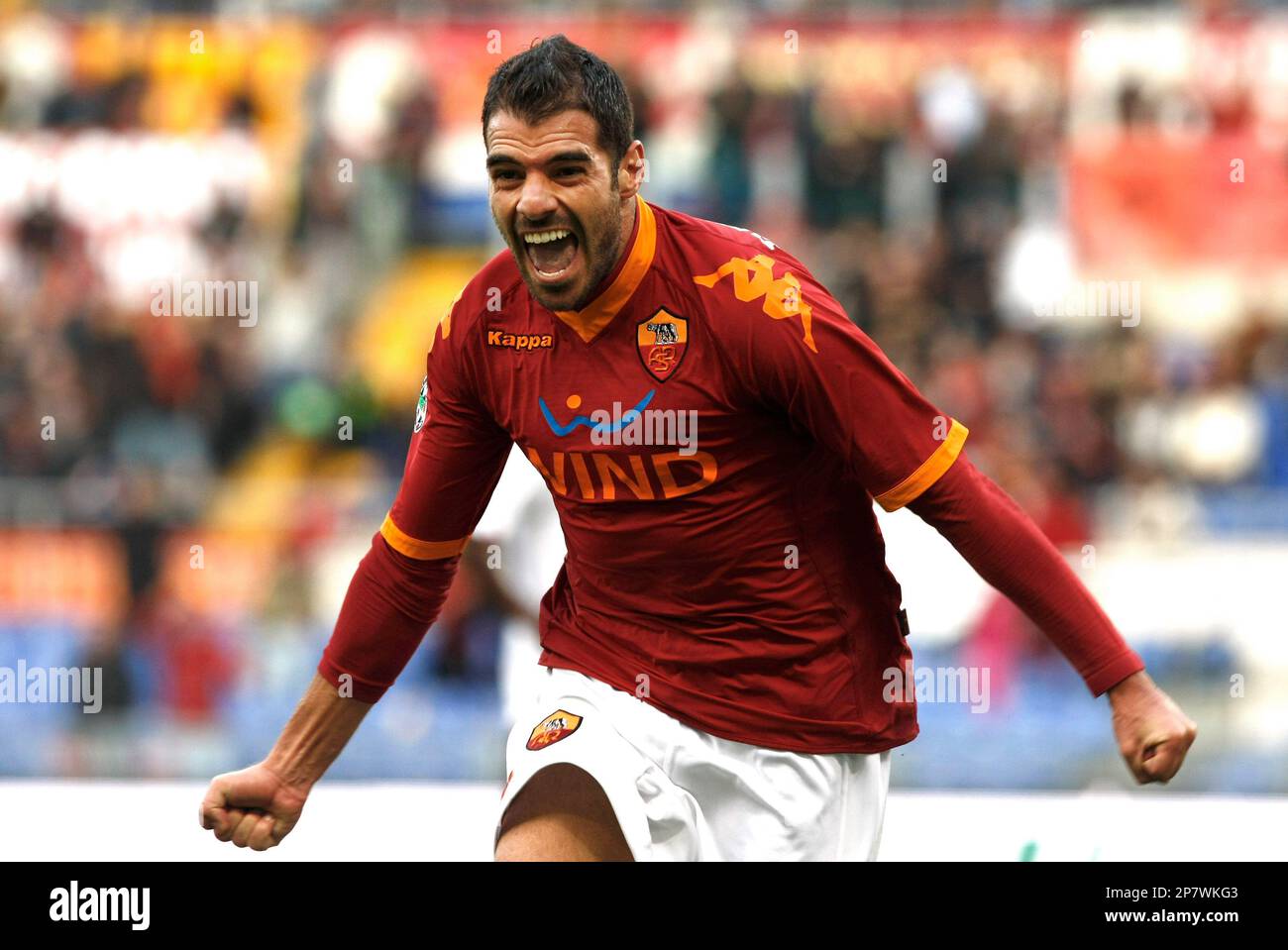 AS Roma midfielder Simone Perrotta celebrates after scoring during the ...