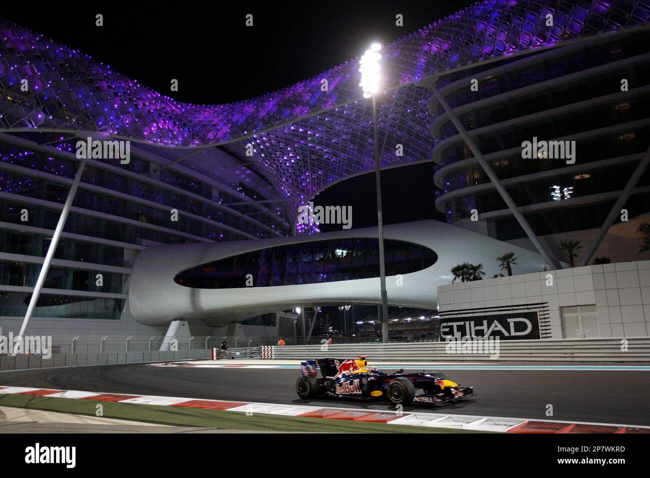 Red Bull driver Mark Webber of Australia steers his car during the Abu ...