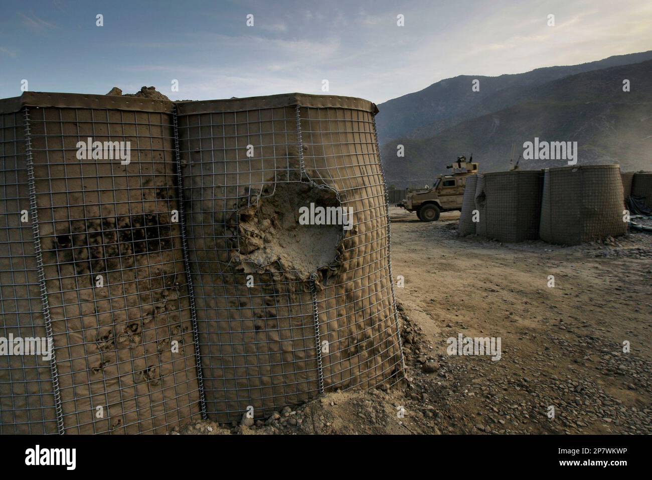 An impact crater in the side of a protective wall, where a Taliban ...