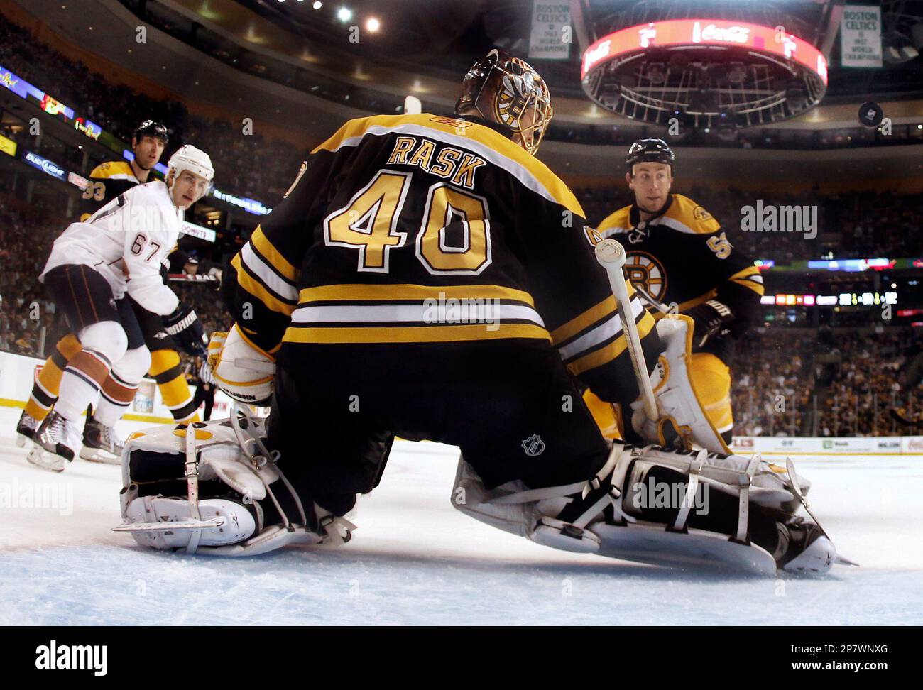 Boston Bruins goalie Tuukka Rask (40) makes a save as Edmonton Oilers ...