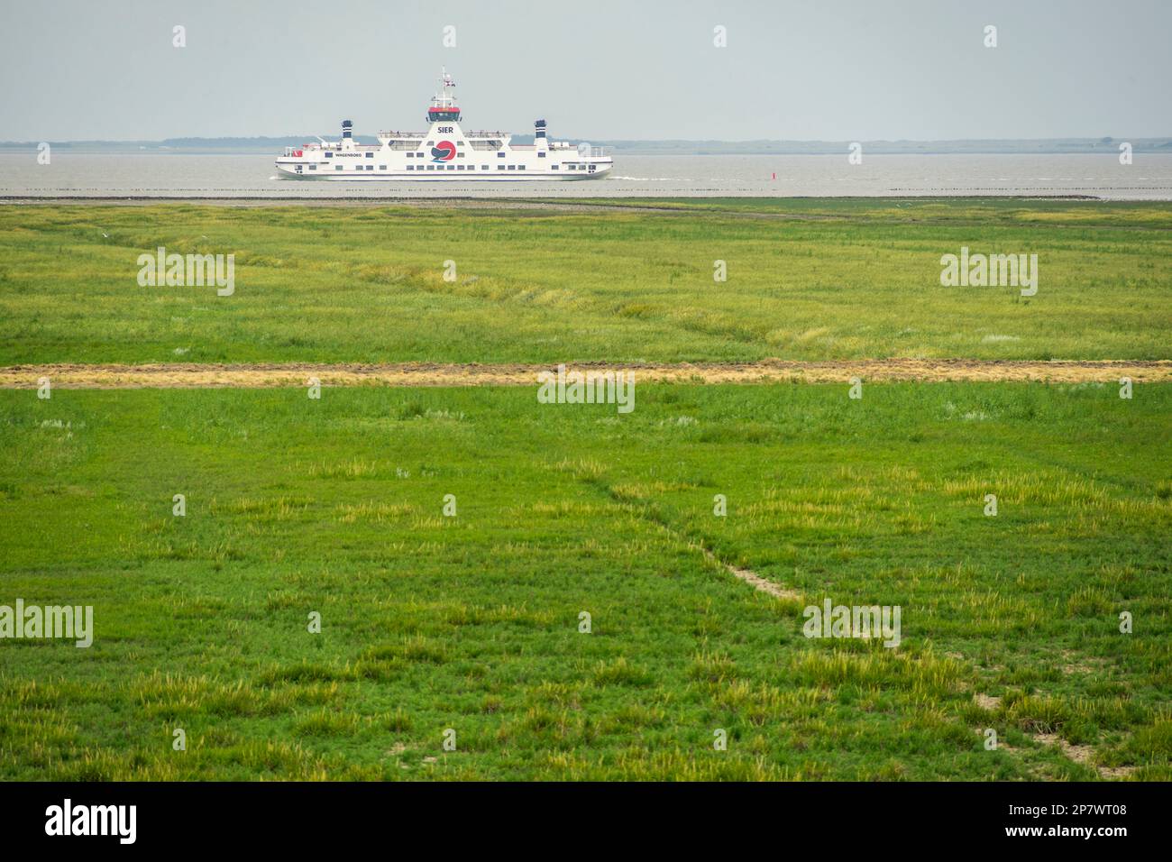 The ferry between the mainland and the island of Ameland, Netherlands ...