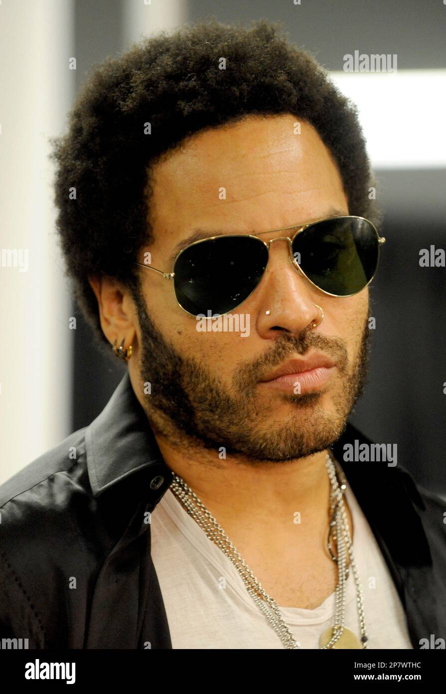 Lenny Kravitz poses for photos in the press room at the 25th ...