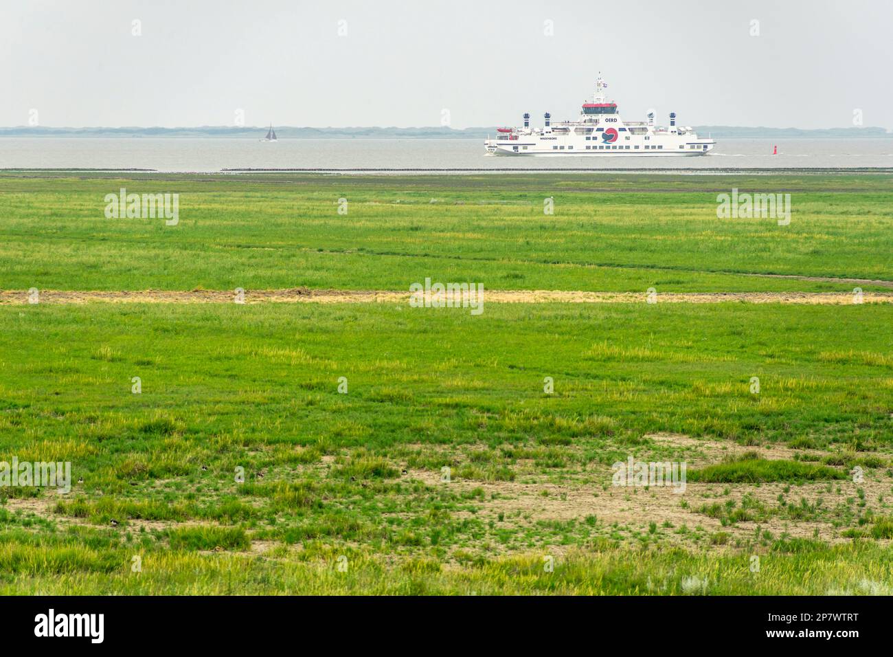 The ferry between the mainland and the island of Ameland, Netherlands ...