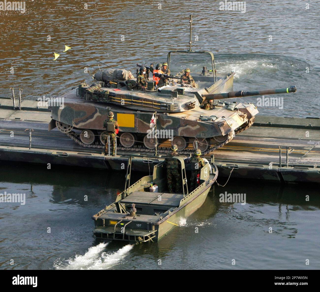 South Korean Army tank crosses a river during a river crossing ...