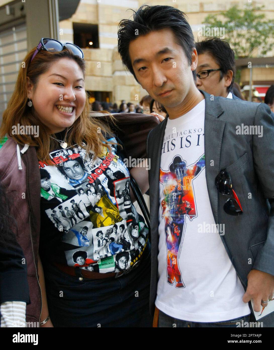 Japanese Michael Jackson's fans pose for photographers before Japan ...