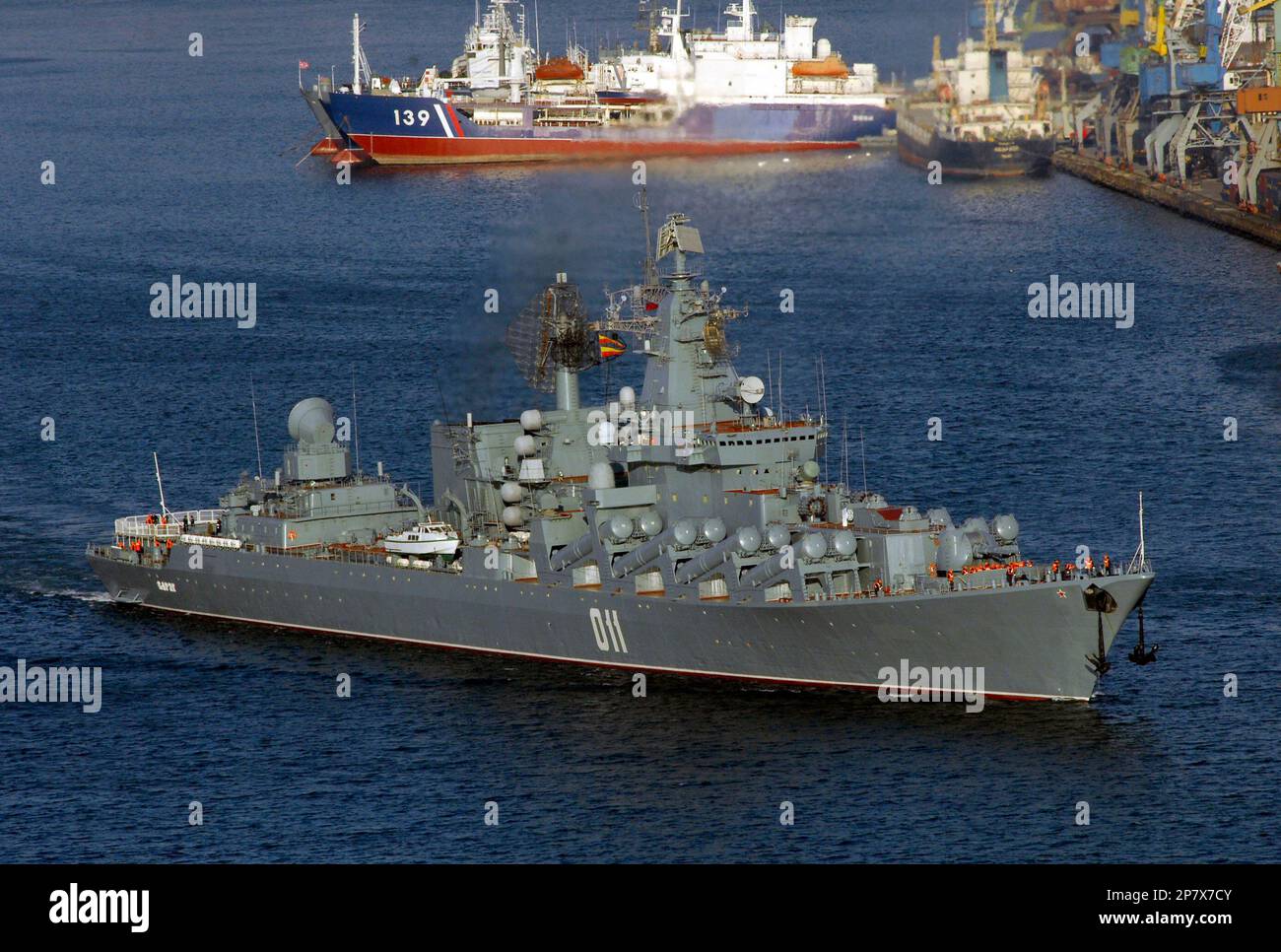 The Russian Varyag guided missile cruiser, Slava class, leaves the Pacific port of Vladivostok ...