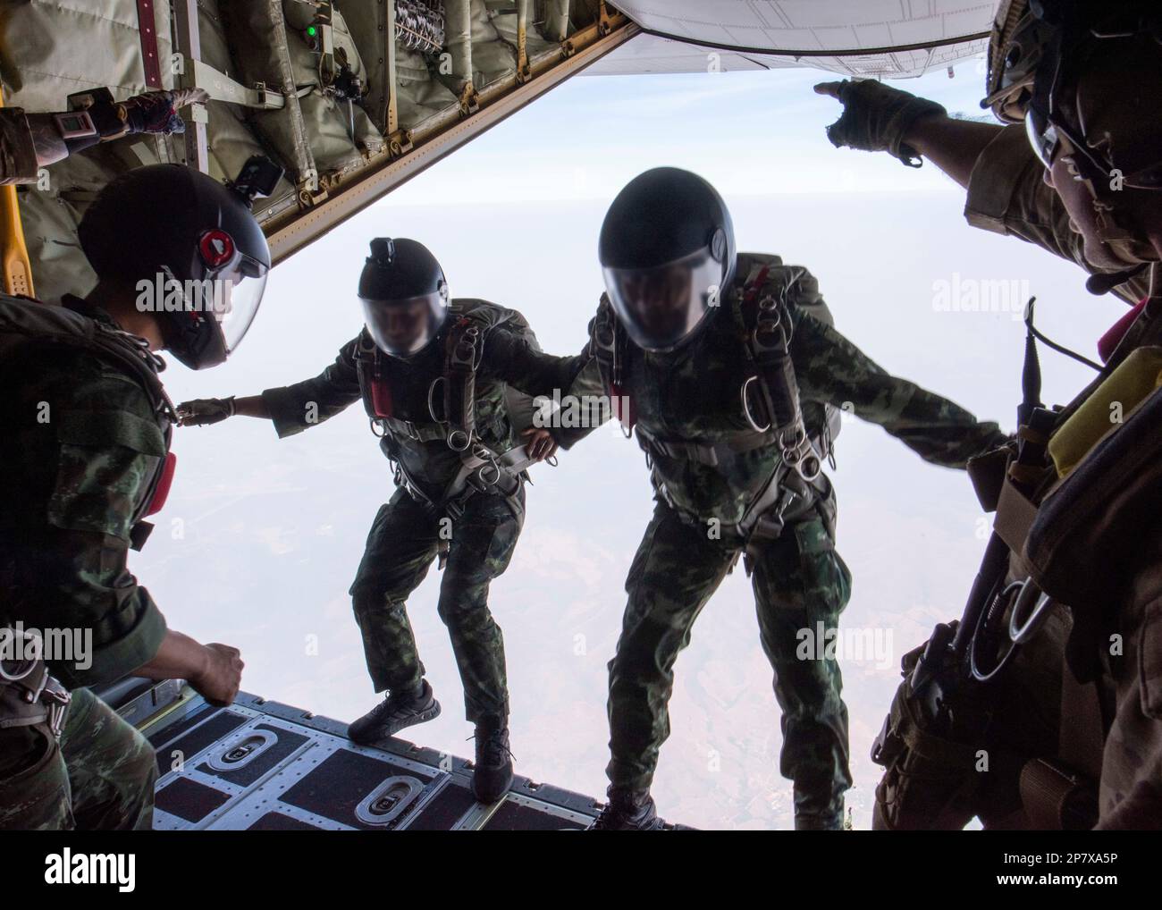 Royal Thai Army Special Forces members jump from a 353rd Special ...