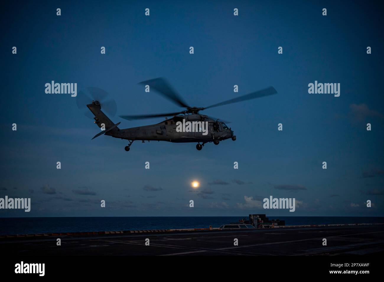 230307-N-DU622-1097 PHILIPPINE SEA (March 7, 2023) An MH-60S Sea Hawk ...