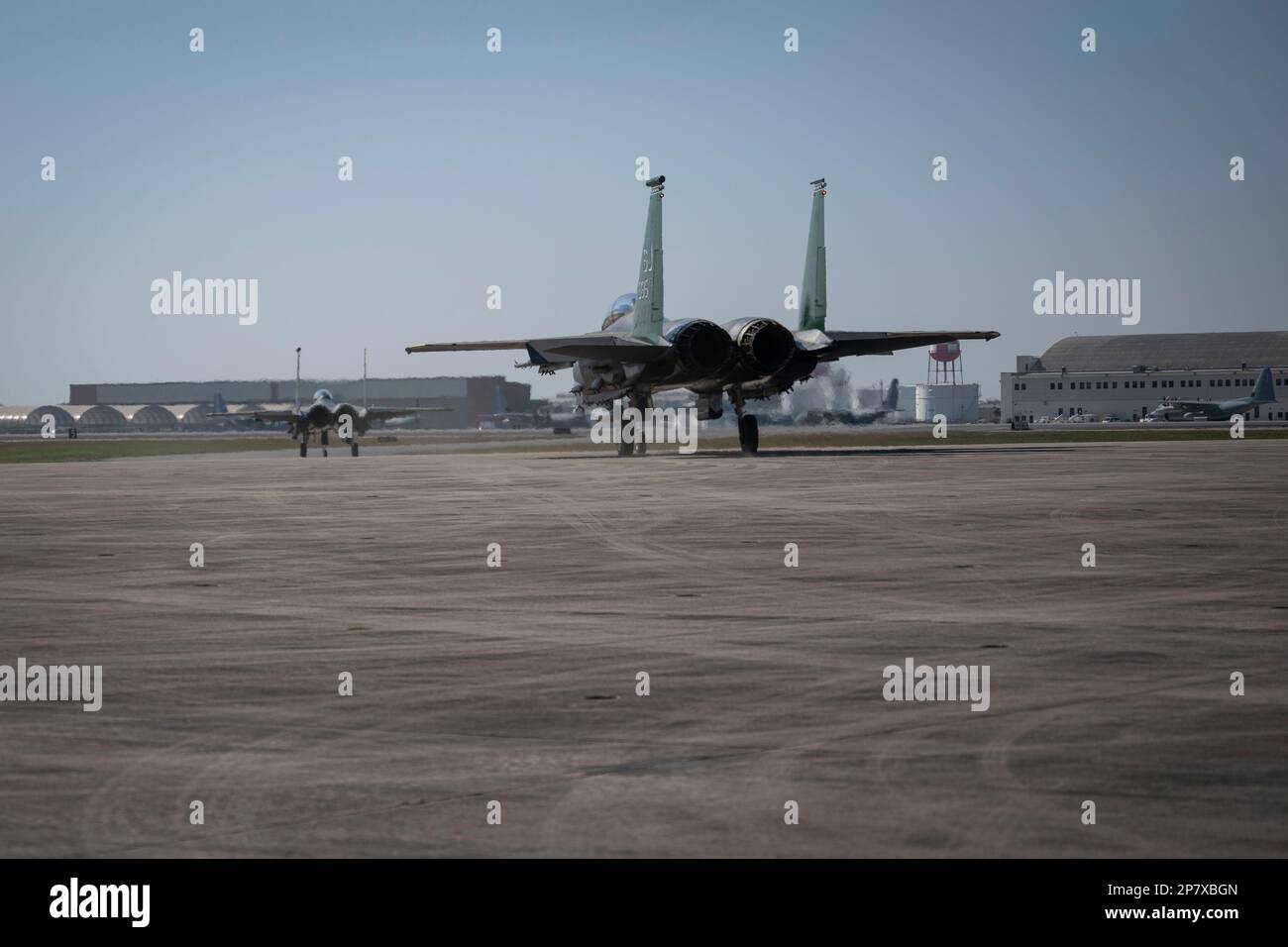 Two F-15E Strike Eagles assigned to the 4th Fighter Wing taxi during ...