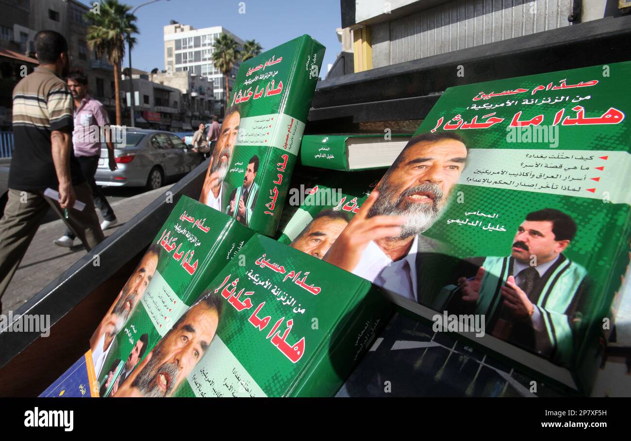 Copies of the book "Al Ra'ees Al Shaheed" (The Martyred President) by ...