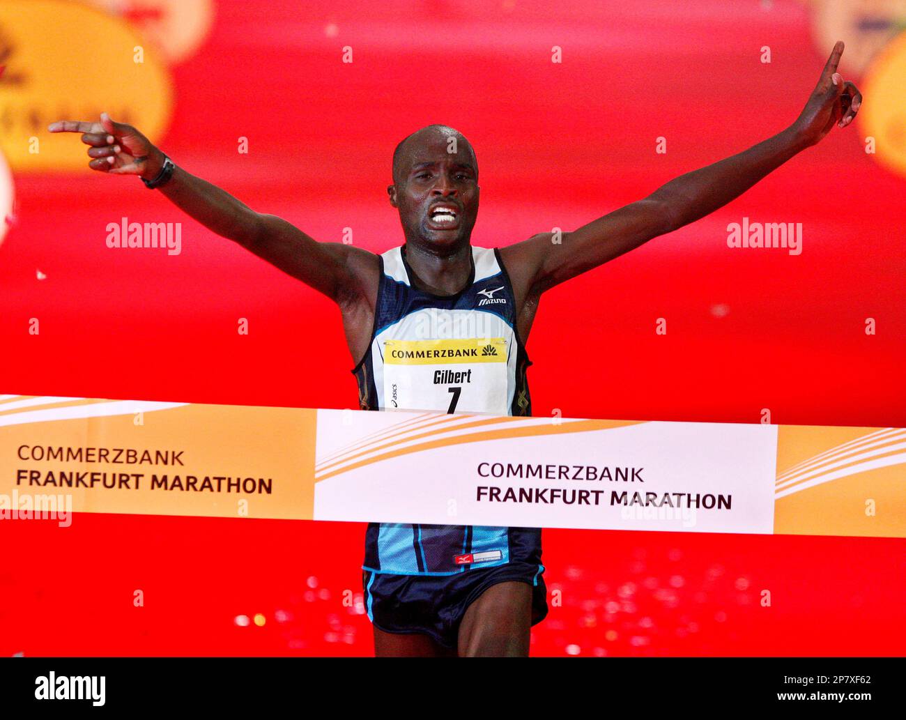 Kenya's Gilbert Kirwa crosses the finish line to win the Frankfurt ...