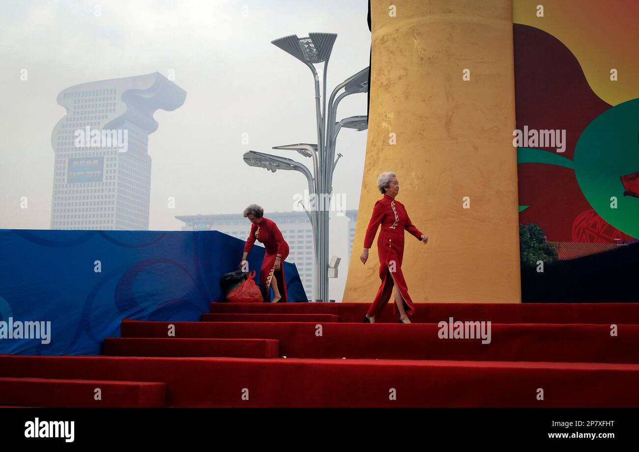 A pair of 70-year-old elderly Chinese models seen near the stage after ...