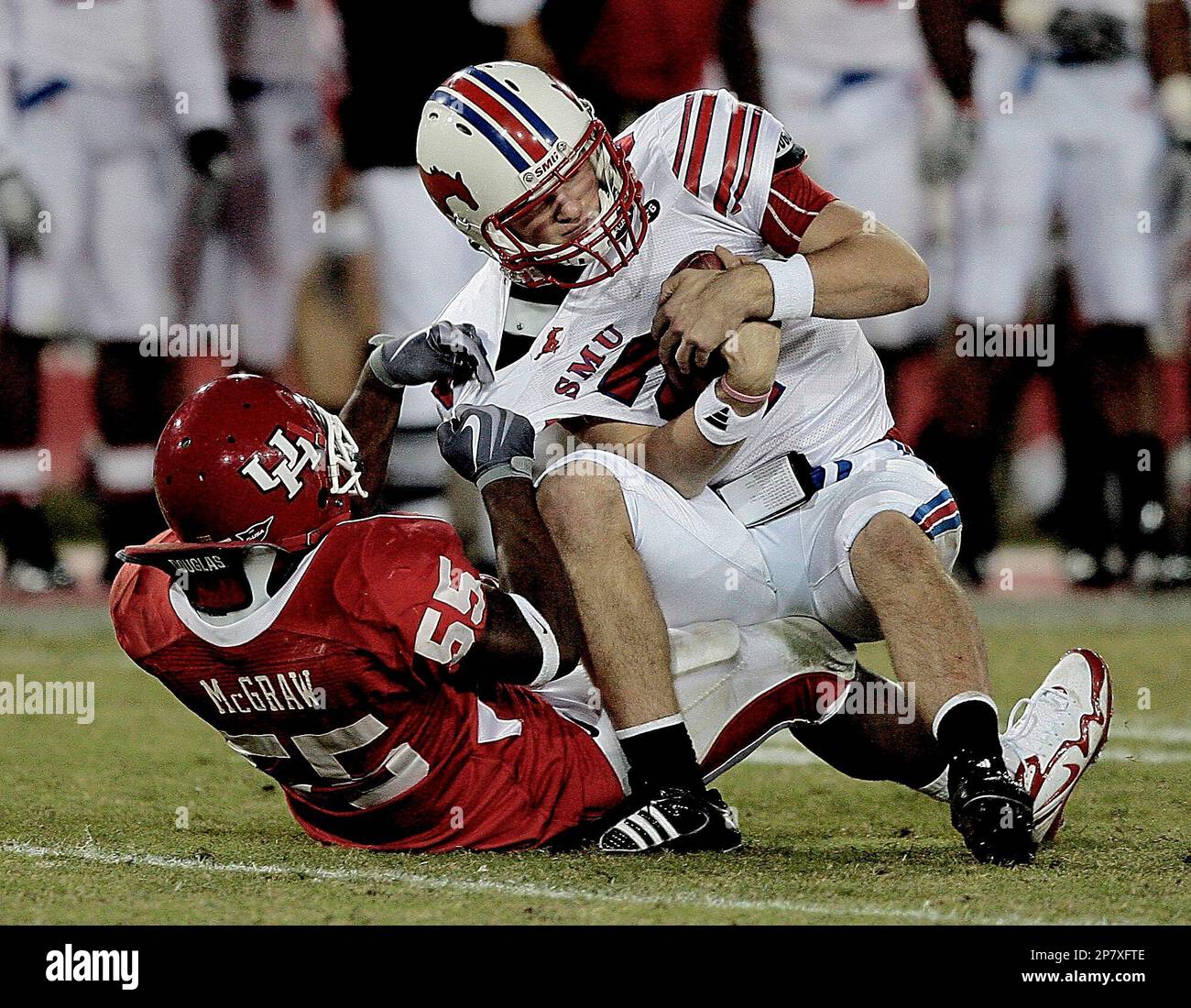 SMU quarterback Kyle Padron is sacked by Houston linebacker Marcus ...