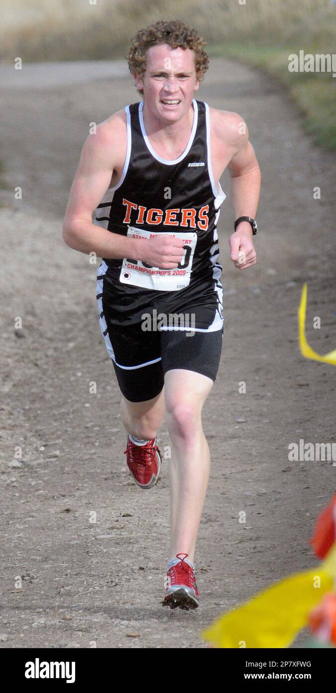 Manhattan's Mike Asay wins the individual race in the Class B boys ...