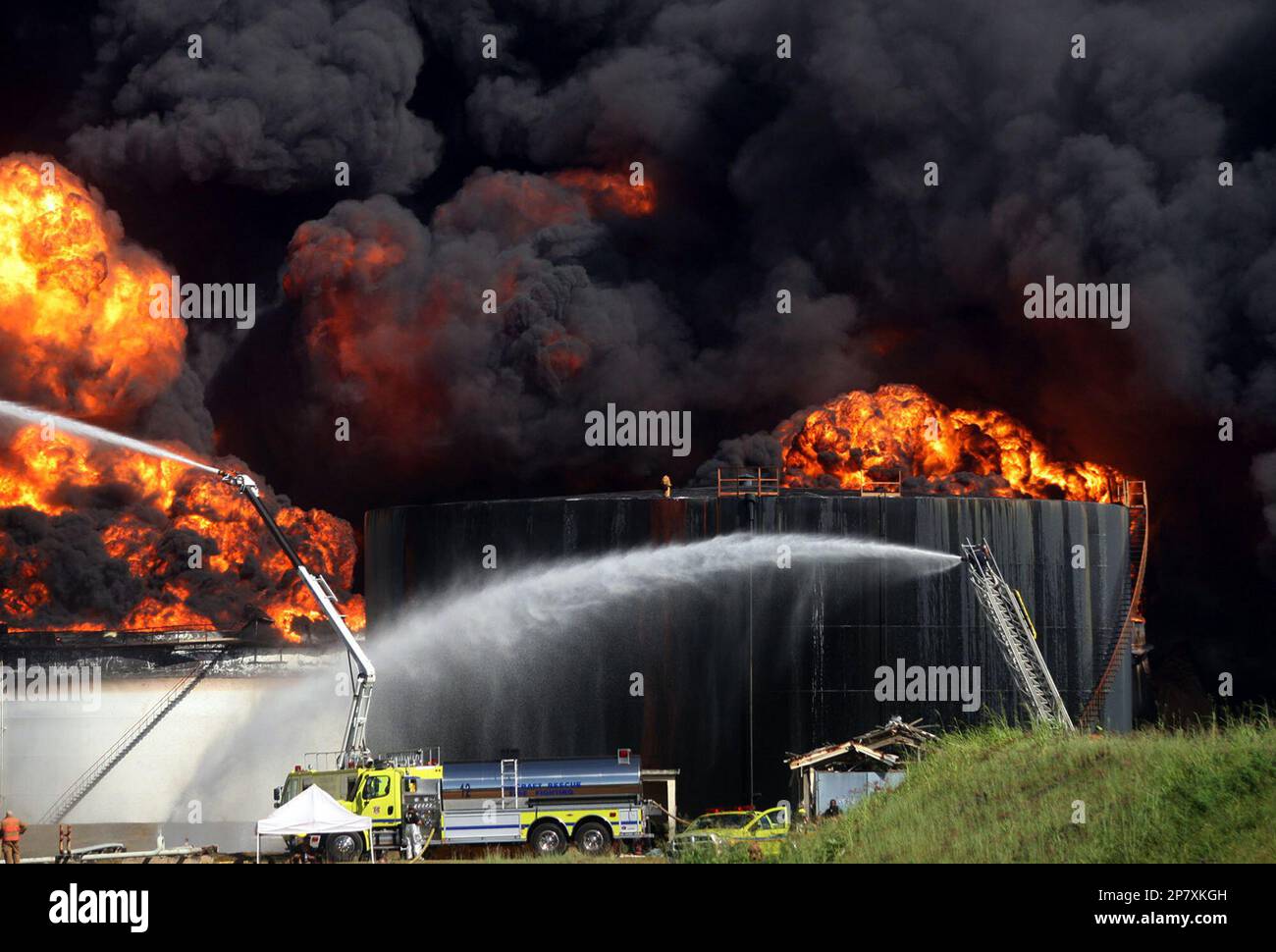 Firefighters battle a blaze at a fuel storage facility run by Caribbean ...
