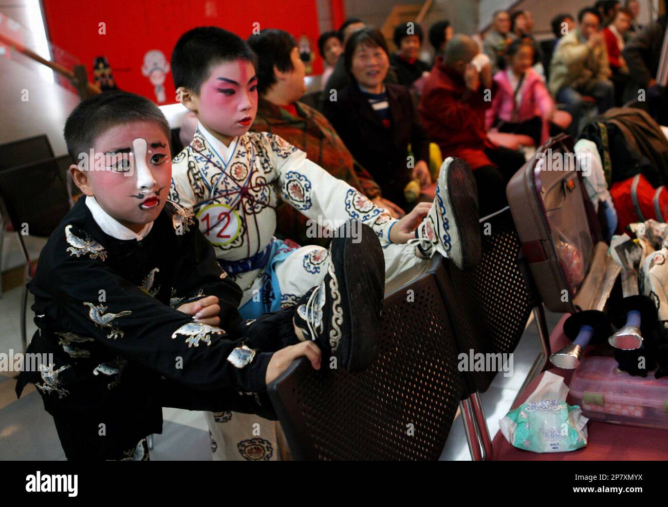Two boys prepare for the Peking Opera performance during the 2006 ...