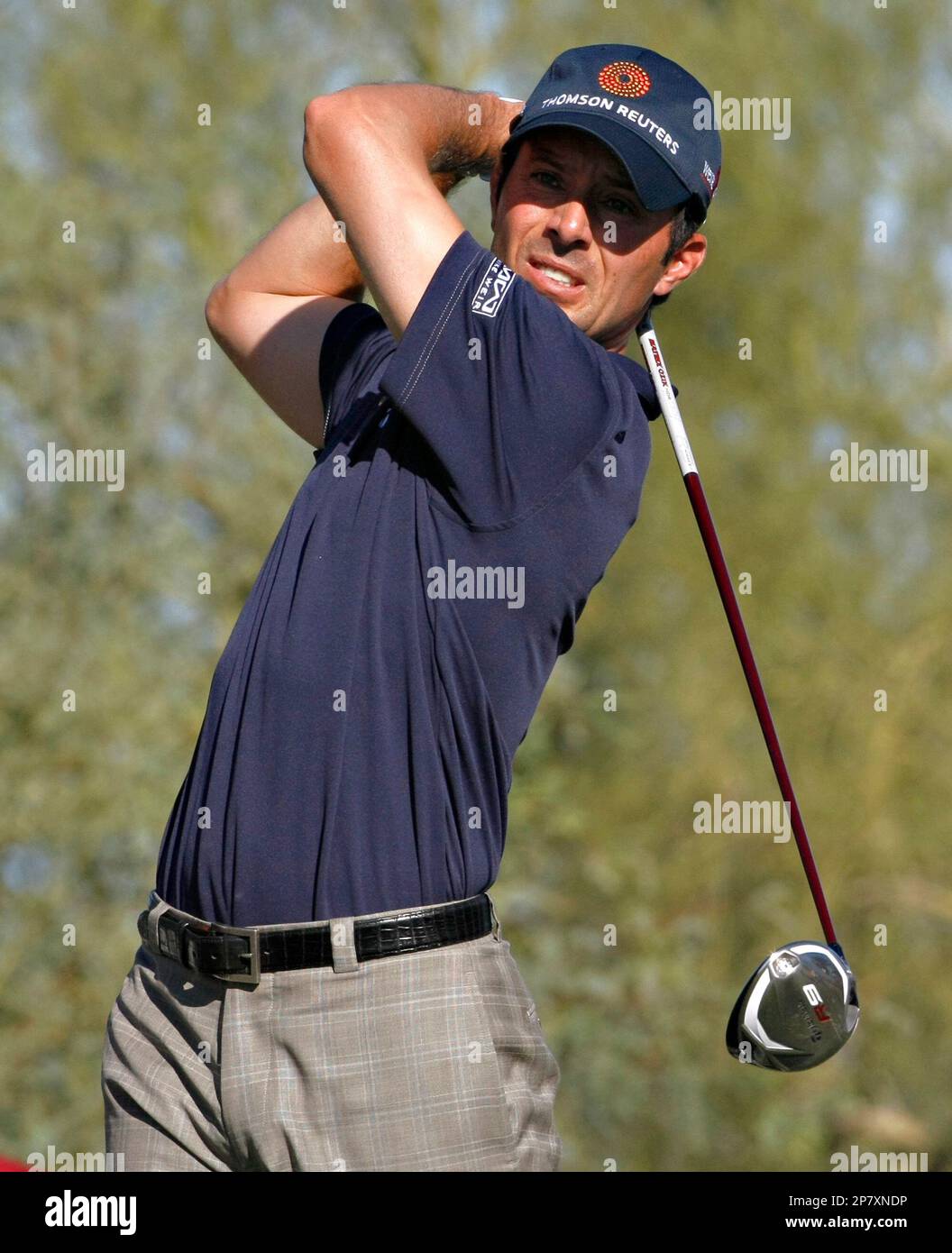 Mike Weir,of Canada, hits from the 18th tee during the second round of ...