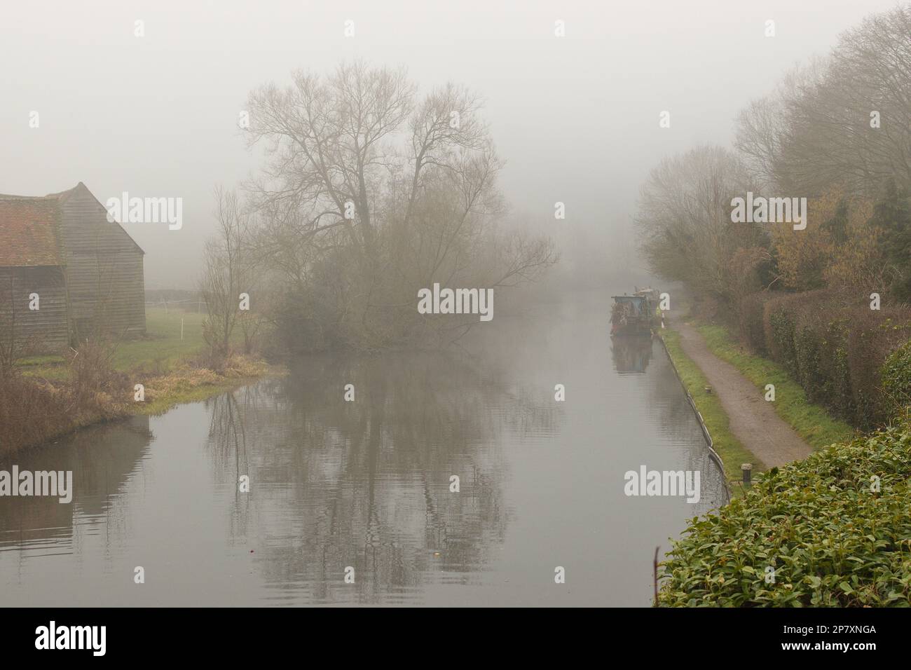 Misty winter morning on the Grand Union Canal in the Colne valley on ...
