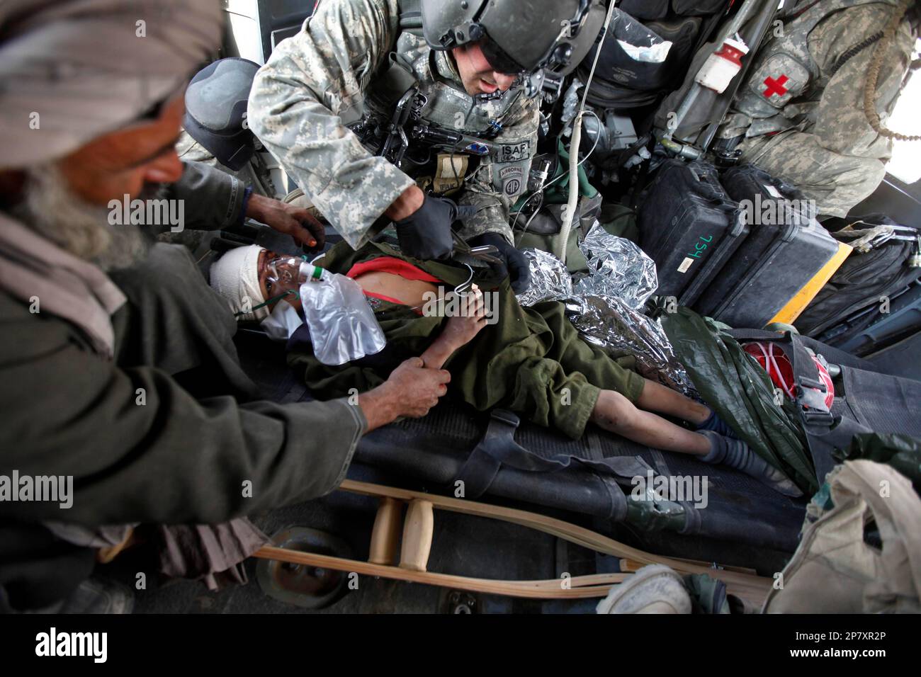 During a medevac mission, U.S. Army Flight Medic Sgt. Nathaniel Dabney ...