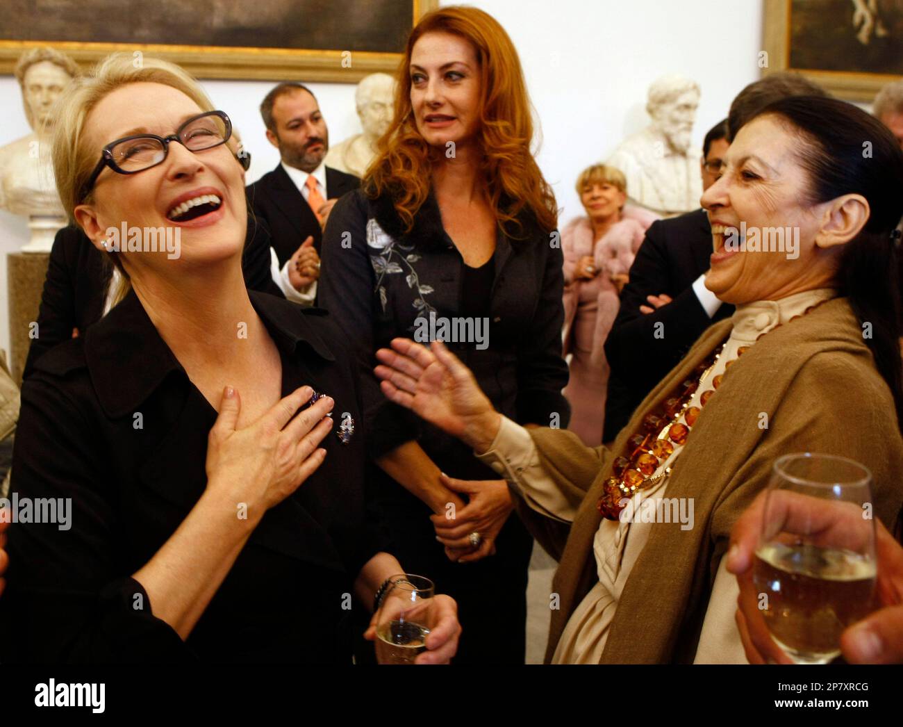Actress Meryl Streep, left, shares a light moment with Italian ballet ...