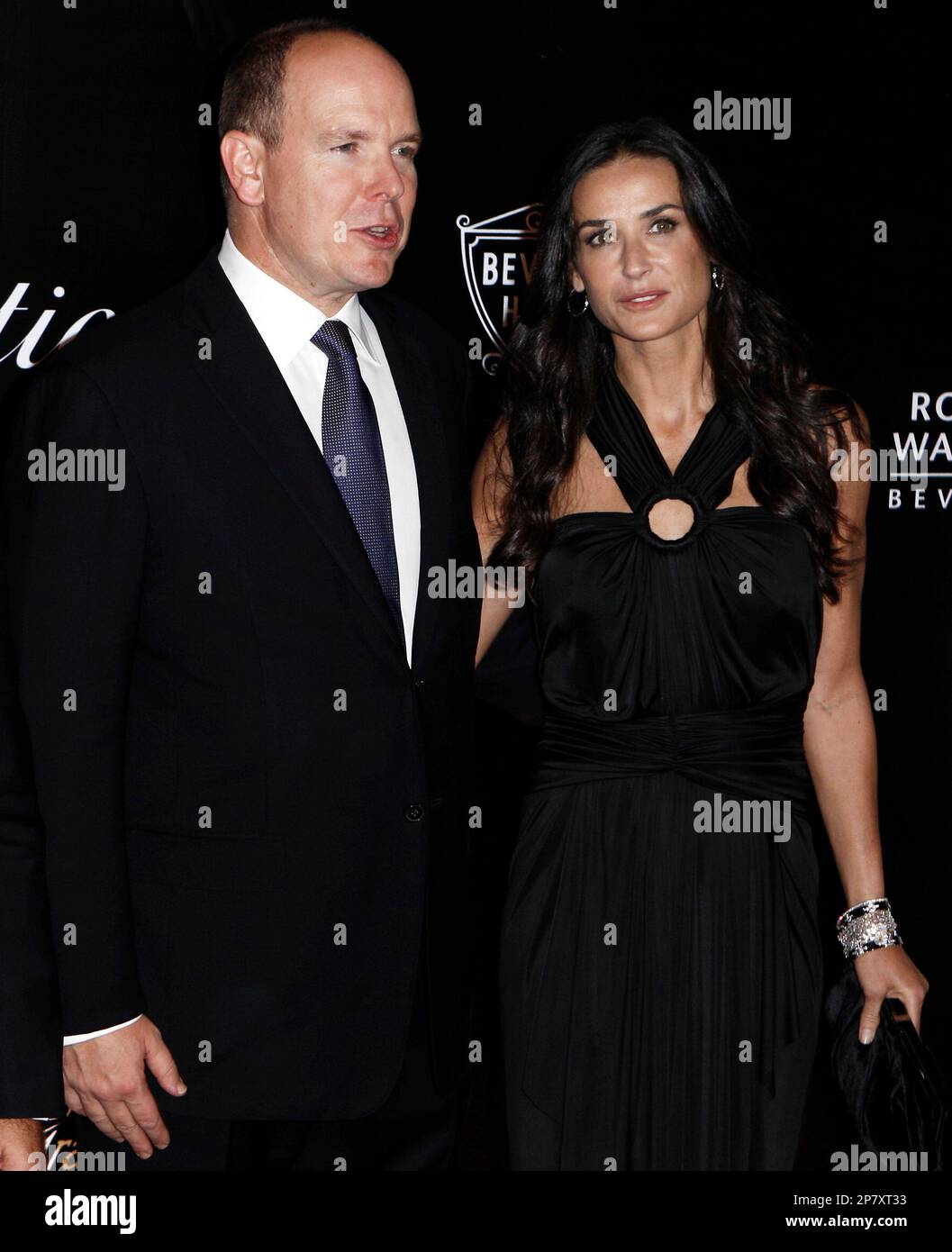 Prince Albert of Monaco, left, and actress Demi Moore pose together at ...