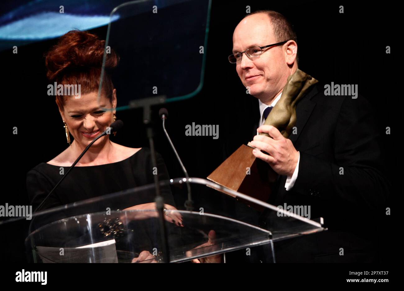 Prince Albert of Monaco, right, accepts a Rodeo Walk of Style Award ...