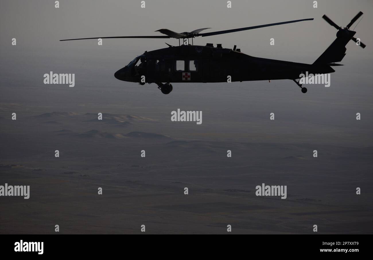 A U.S. Army Black Hawk medical evacuation helicopter flies on a mission ...