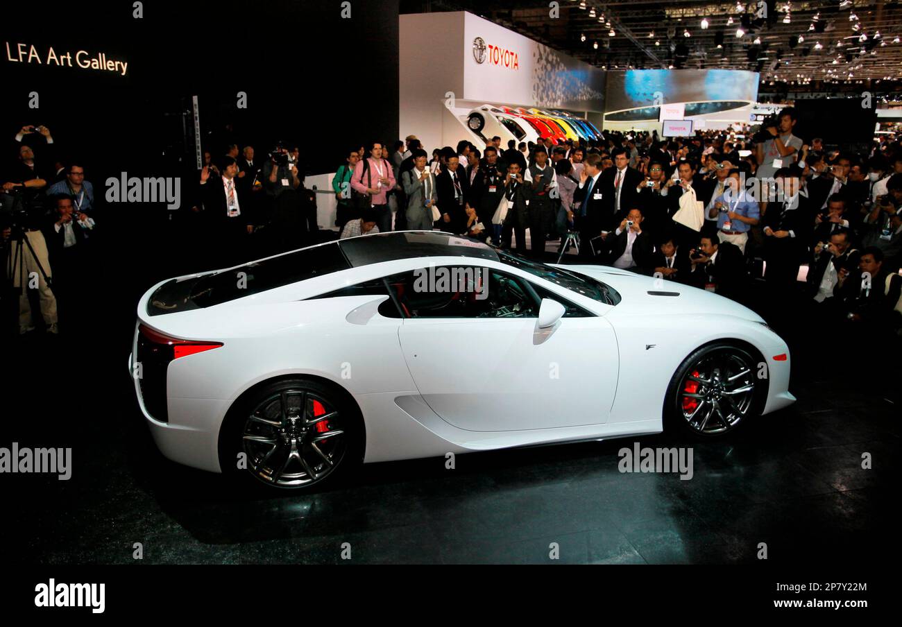 Visitors look at Toyota Motor Corp.'s Lexus LFA at the 41st Tokyo Motor ...