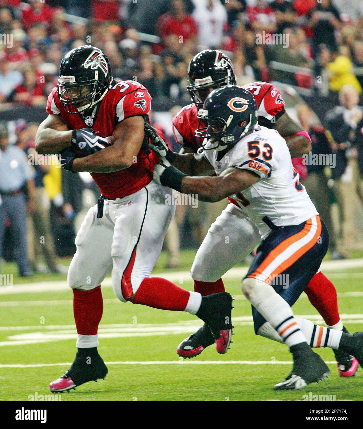 Atlanta Falcons running back Michael Turner (33) scores on a five-yard ...