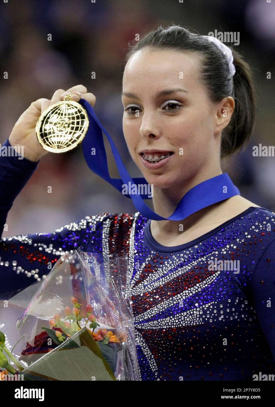 Elizabeth Tweddle of Britain stands on the podium with her gold medal ...