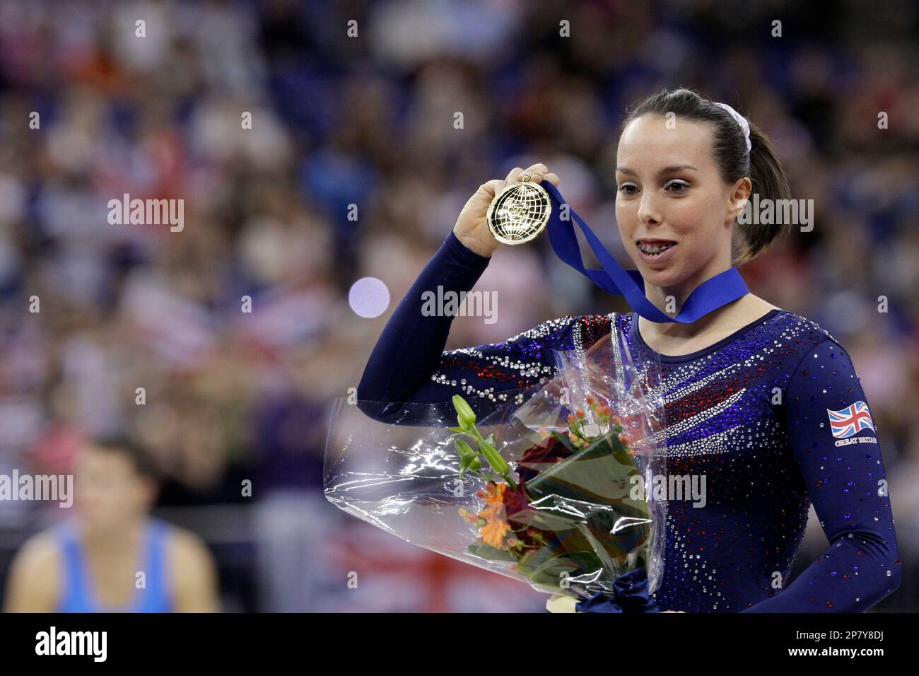 Elizabeth Tweddle of Britain stands on the podium with her gold medal ...