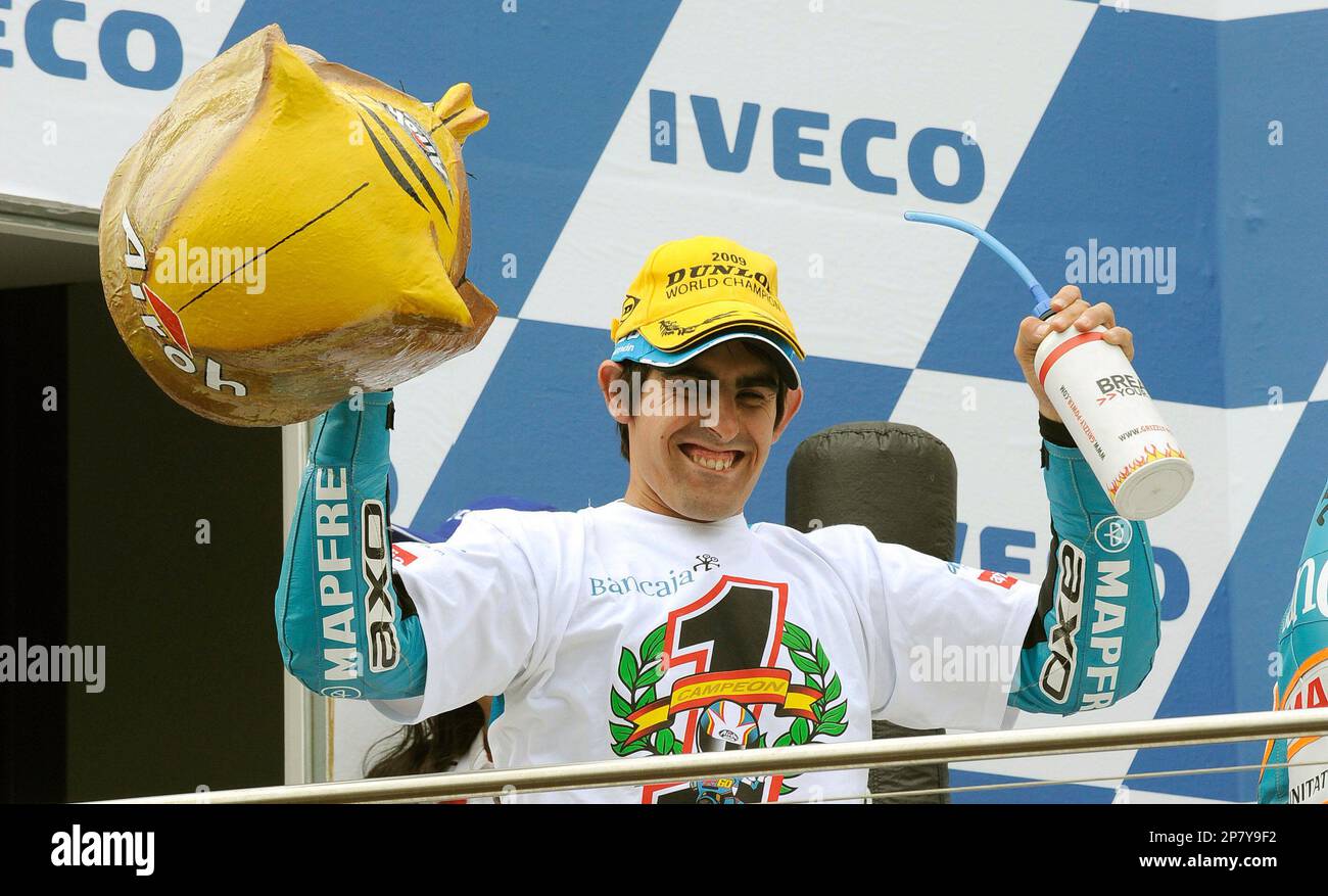 Spain's 125cc rider Julian Simon of Bancaja Aspar Team celebrates after ...