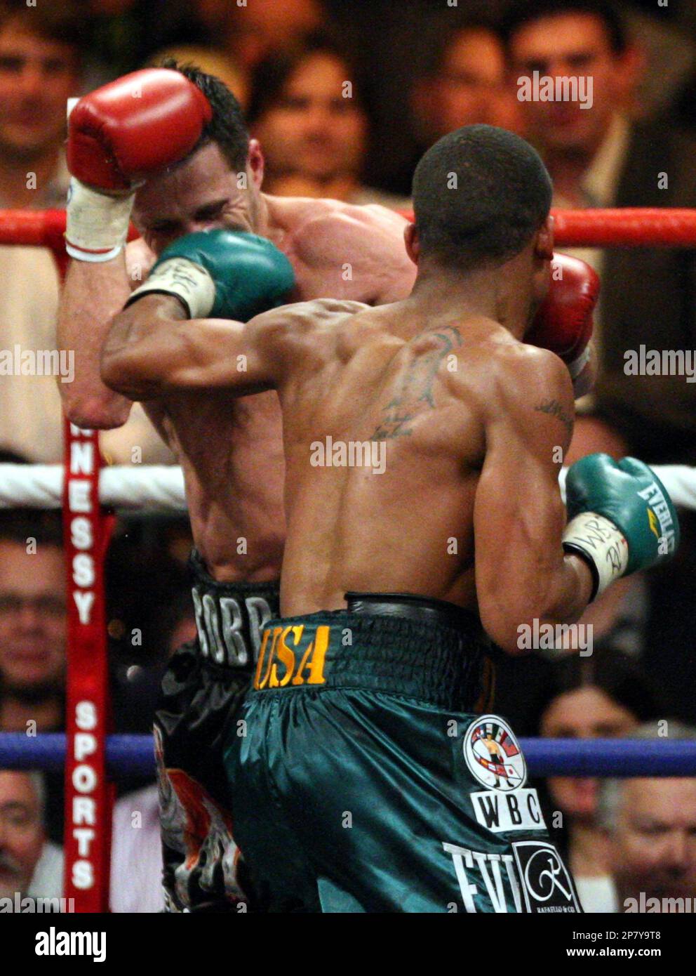 Britain's WBC super-middleweight boxing champion Carl Froch, background ...