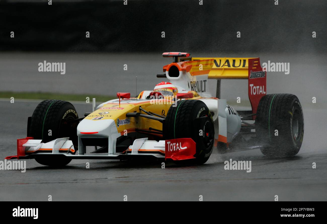 Renault's driver Fernando Alonso, of Spain, steers his car during a free practice for Brazil's ...
