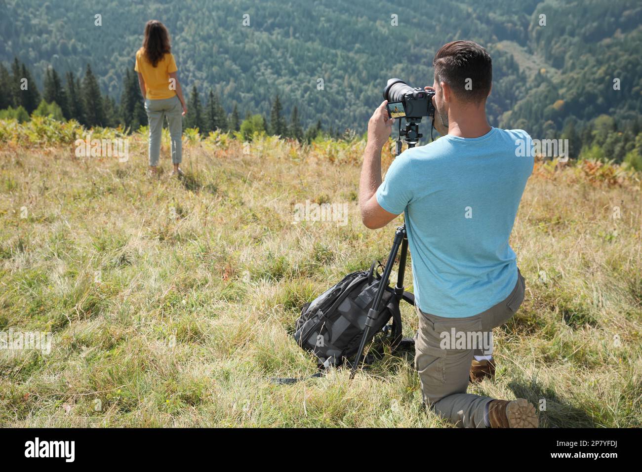 Back view of woman taking picture of hi-res stock photography and ...