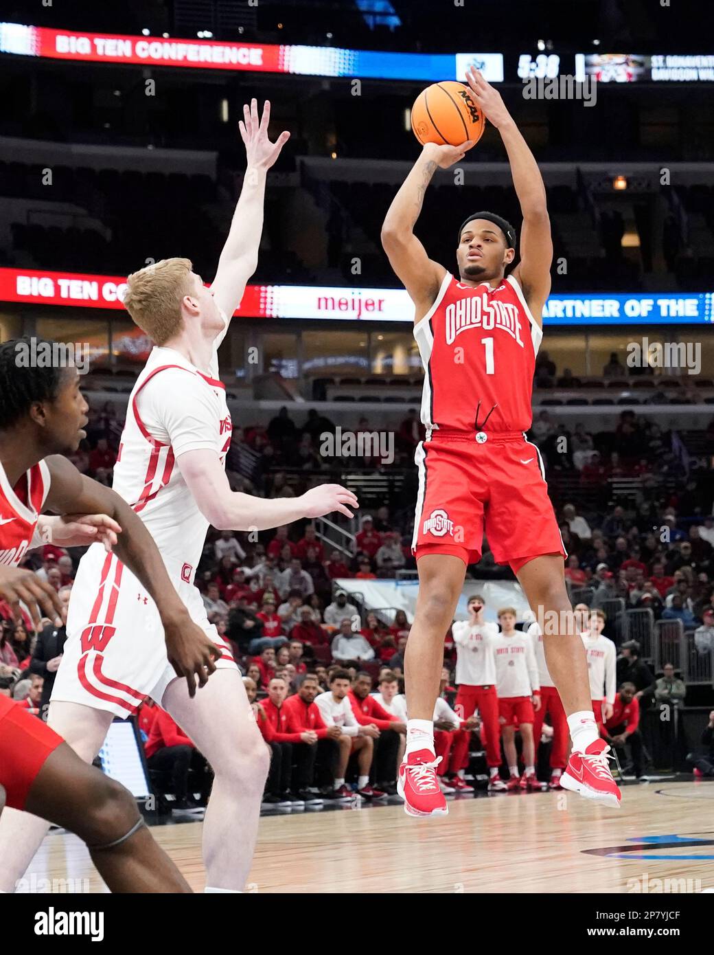 Ohio State's Roddy Gayle Jr. (1) shoots as Wisconsin's Steven Crowl ...