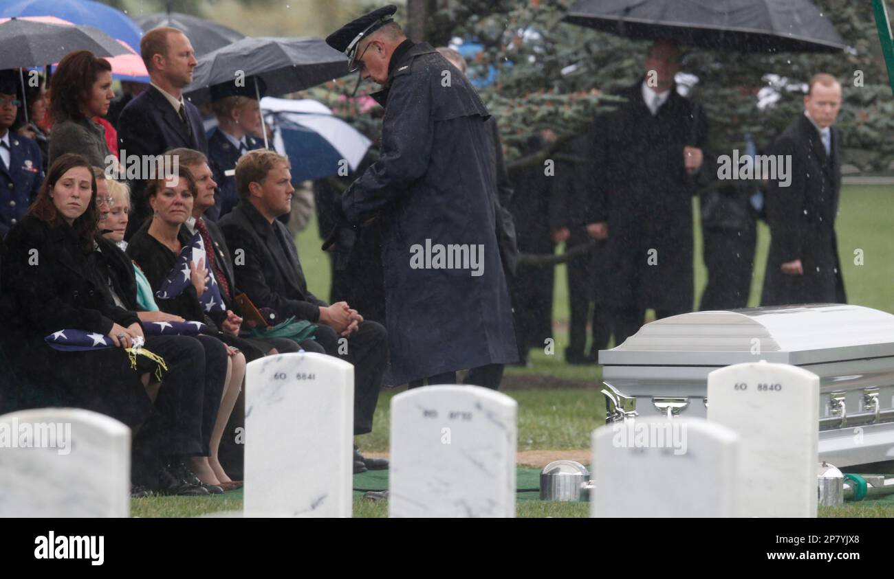 Air Force 1st Lt. Katie McDowell, left, the widow of Air Force Capt ...
