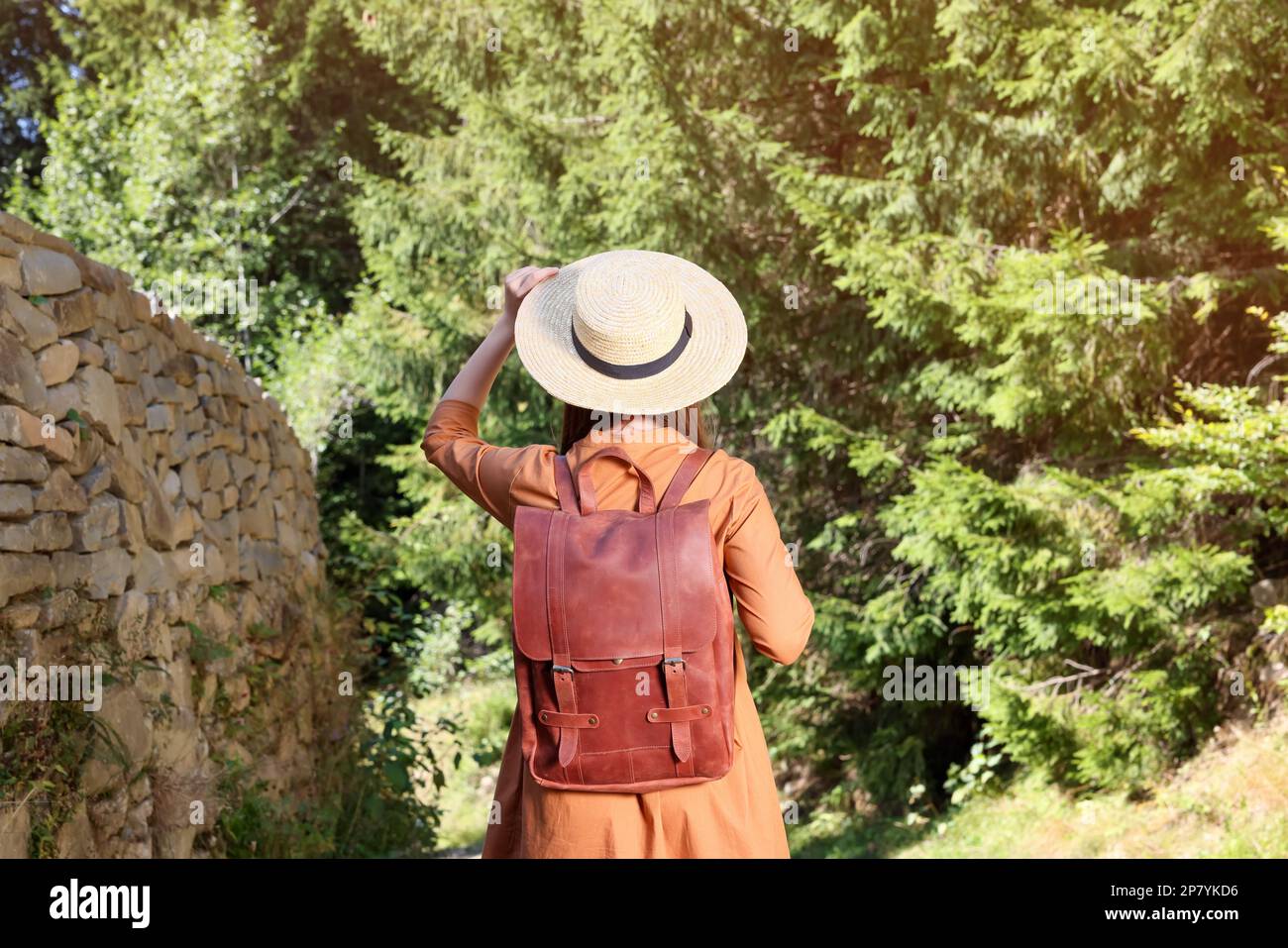 Girl walking along wall hi-res stock photography and images - Alamy