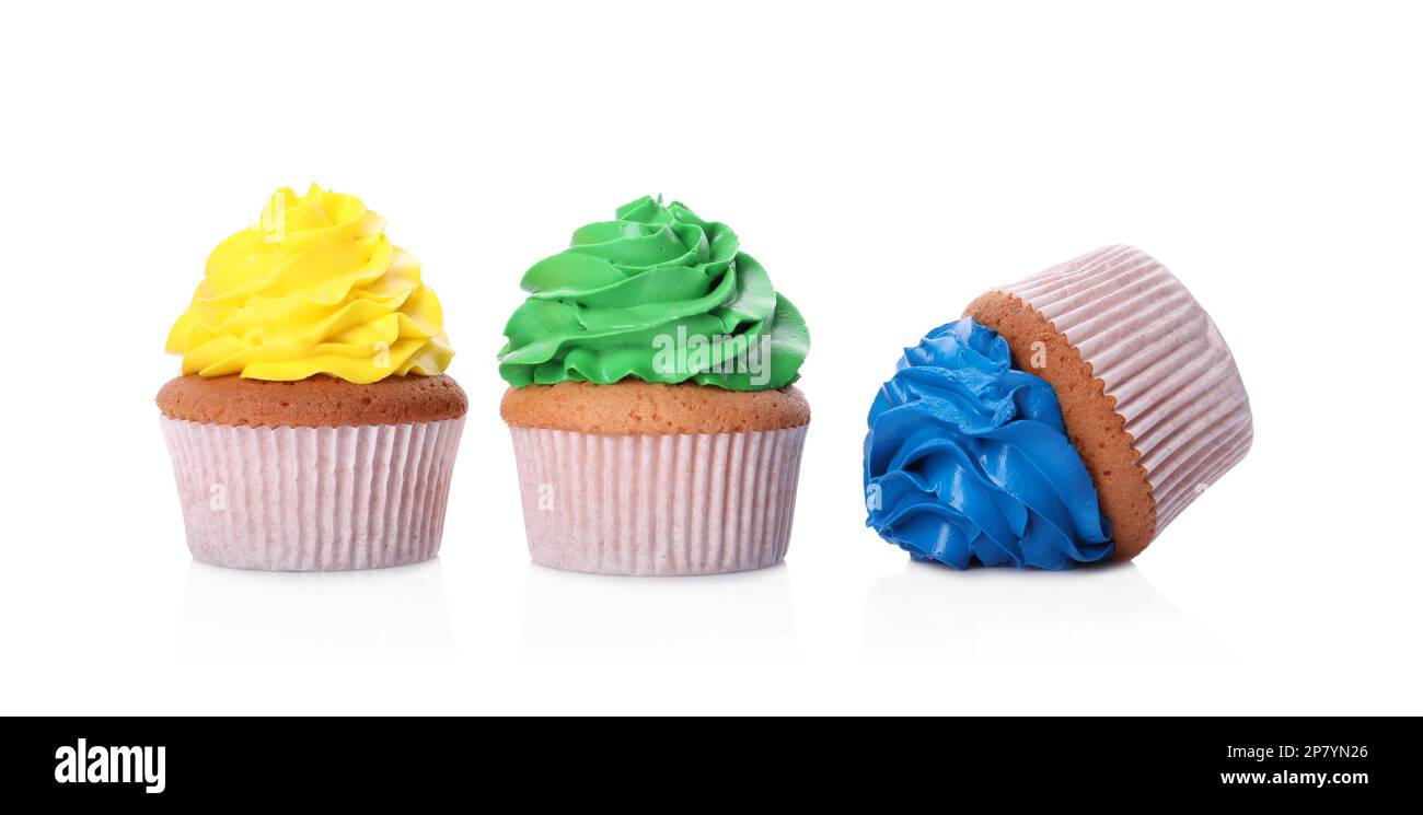 Dropped cupcake among good ones on white background. Troubles happen ...