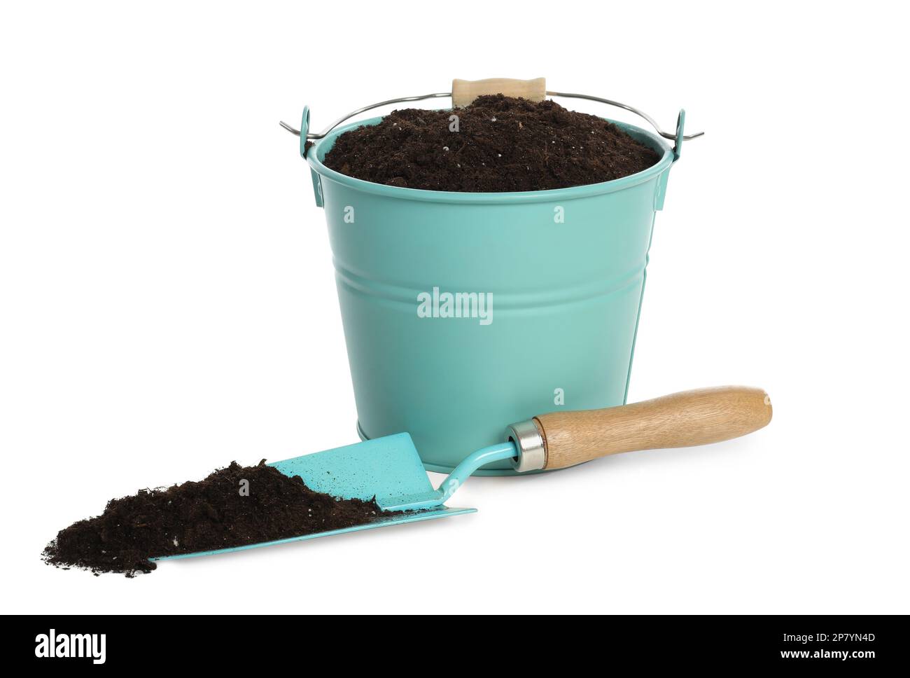 Bucket and shovel with soil on white background. Gardening tool Stock ...