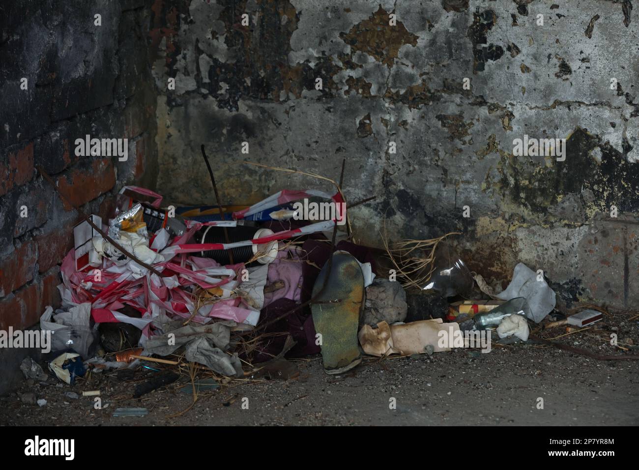 Garbage dump inside of old abandoned building Stock Photo - Alamy