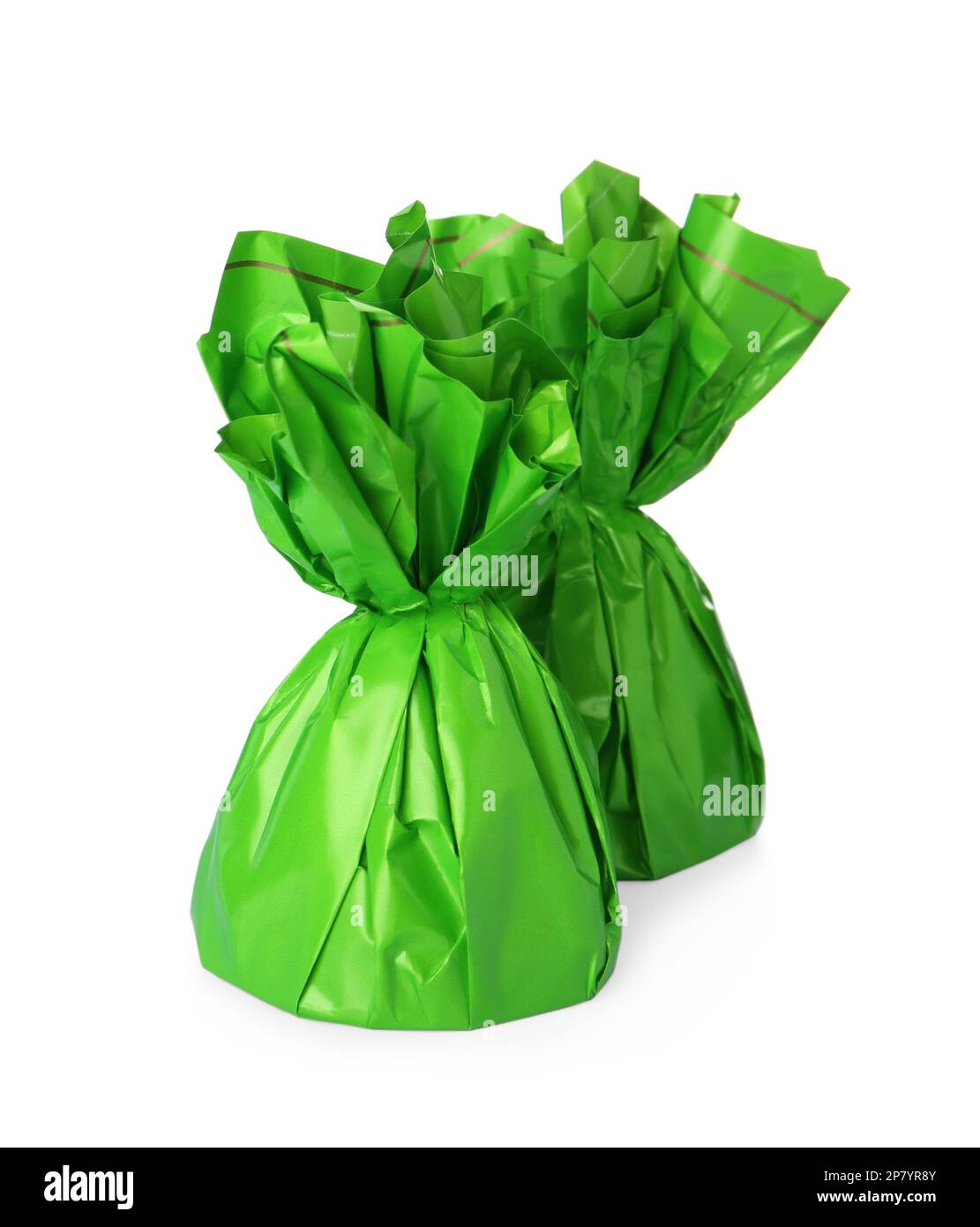 Delicious candies in green wrappers on white background Stock Photo - Alamy