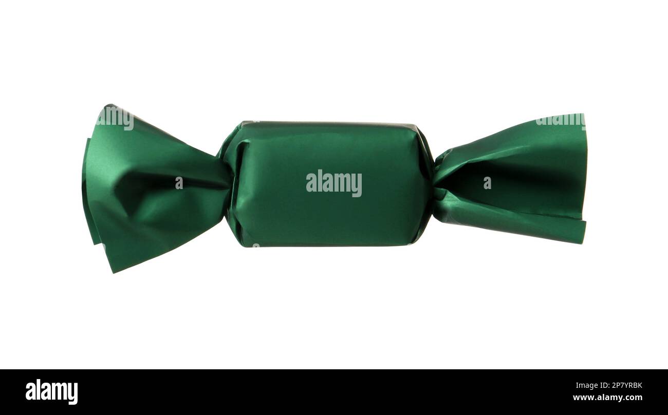 Delicious candy in dark green wrapper isolated on white Stock Photo - Alamy