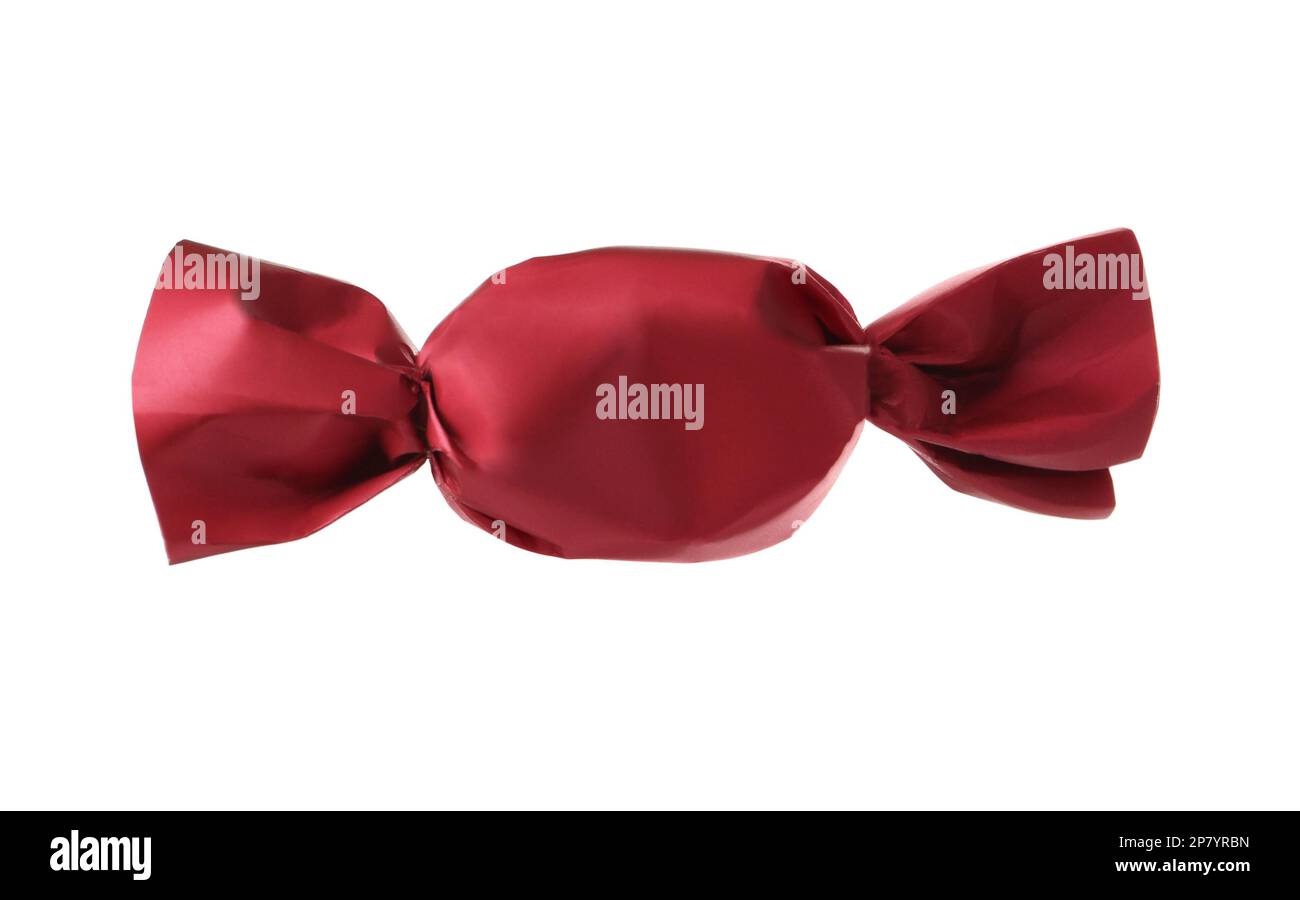 Delicious candy in red wrapper isolated on white Stock Photo - Alamy