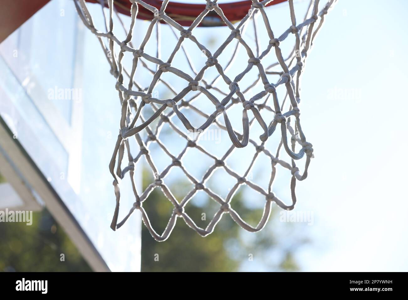 Basketball hoop with net outdoors on sunny day, closeup Stock Photo - Alamy